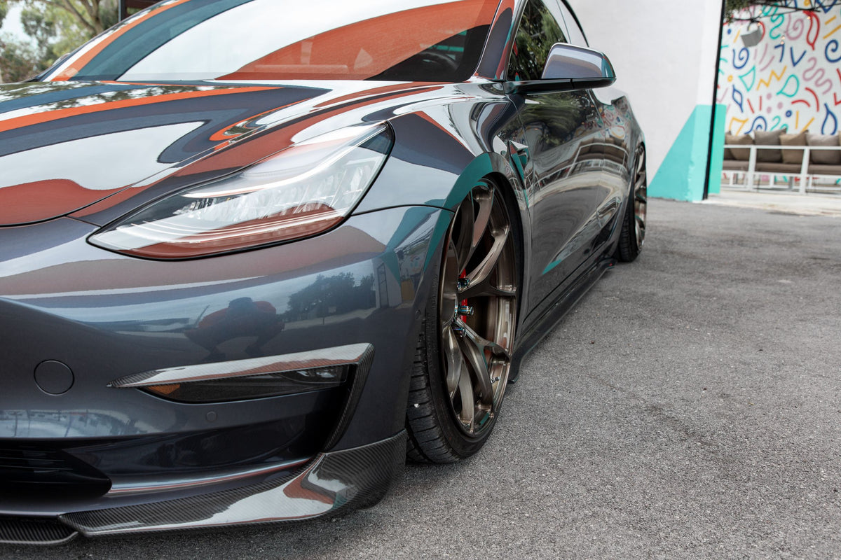 Tesla bear Charlie Munger’s bet on BYD – EVANNEX Aftermarket Tesla ...