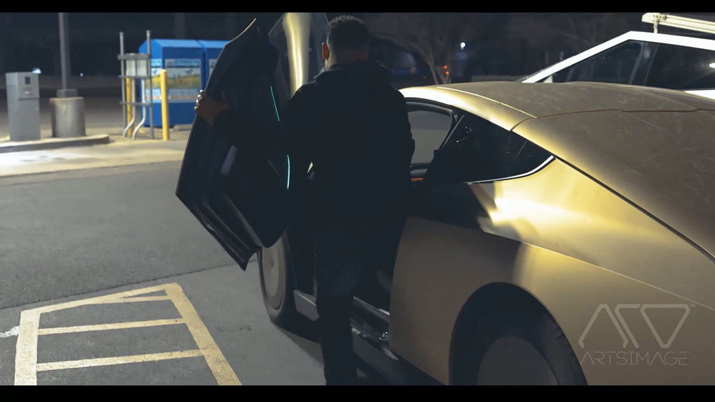 Tesla Robotaxi spotted in the wild showing how its butterfly doors wor ...