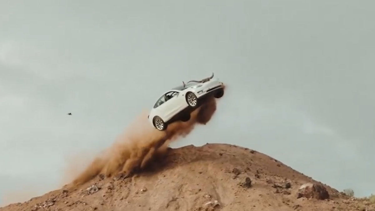 Tesla doesn't catch fire after falling off a cliff (video) – EVANNEX ...